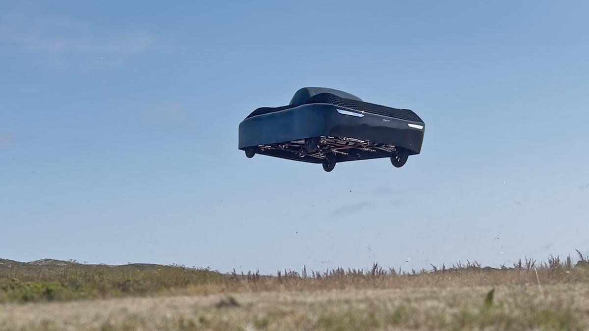 Alef Autonautics test Alef Model Zero flying car in field, fully ...